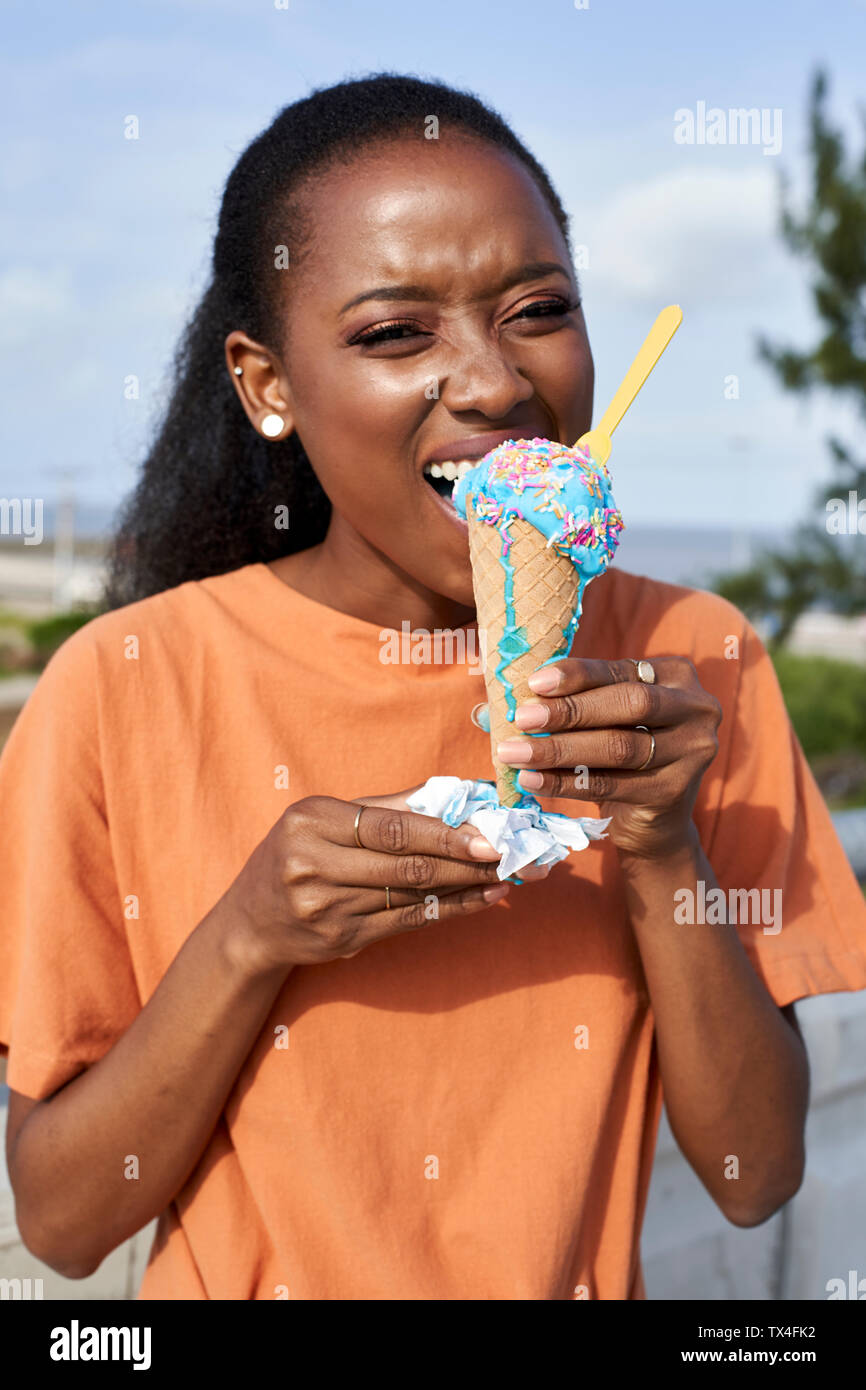Woman Eating Ice Cream Cone