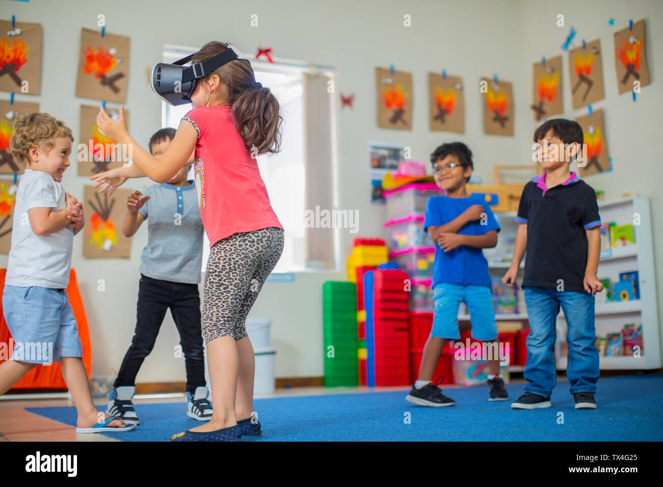 Children with VR glasses playing in kindergarten Stock Photo - Alamy