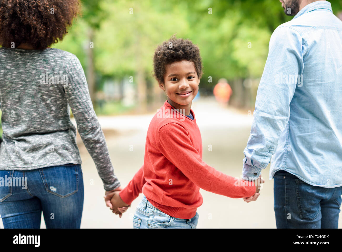 Parents hands hi-res stock photography and images - Alamy