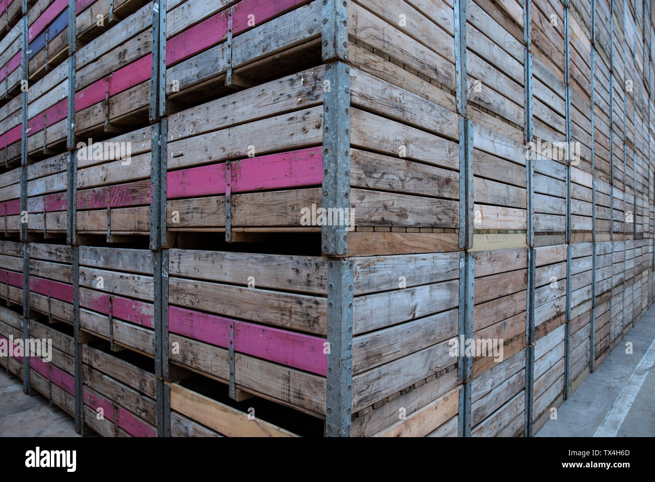 Stacks of crates on factory yard Stock Photo - Alamy