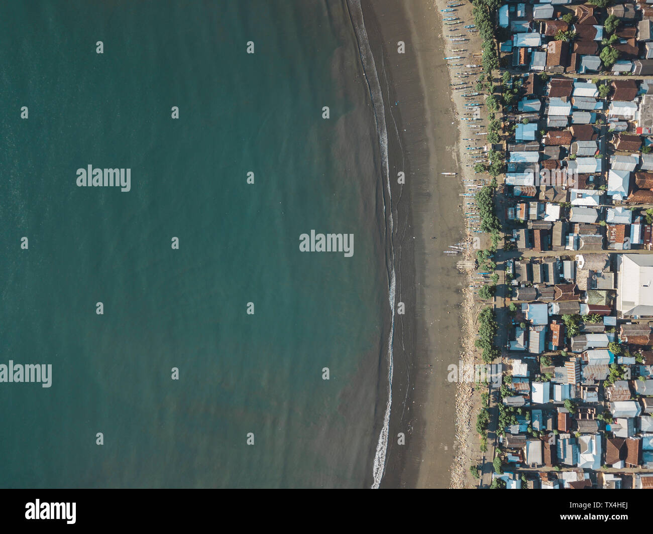 Indonesia, Sumbawa Island, Maluk, Aerial view of coastal town, beach ...