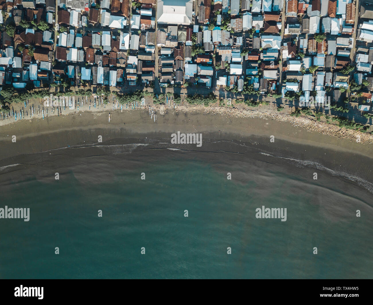 Indonesia, Sumbawa Island, Maluk, Aerial view of coastal town, beach ...