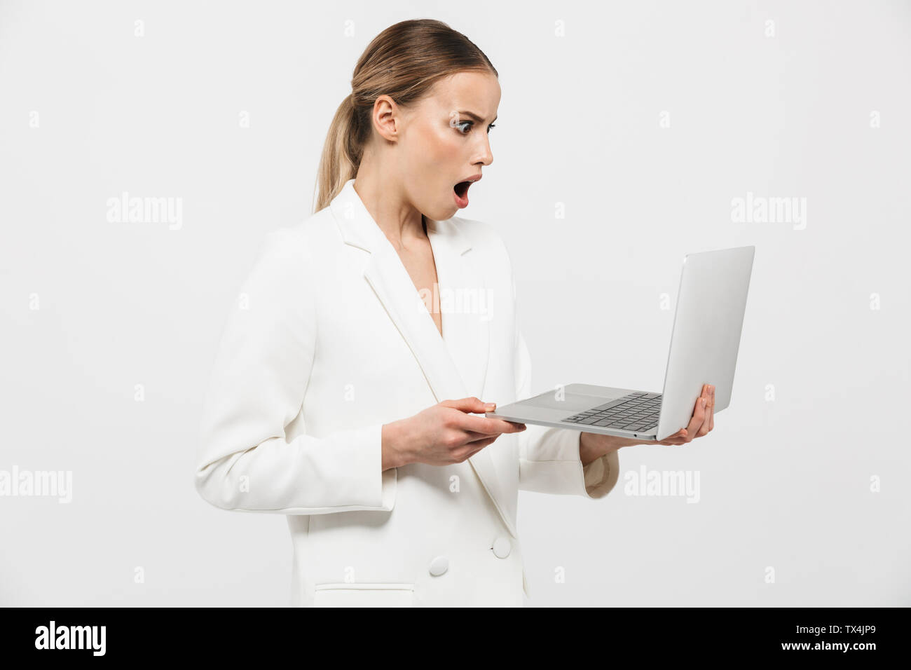 Image of a beautiful shocked excited amazing woman posing isolated over ...