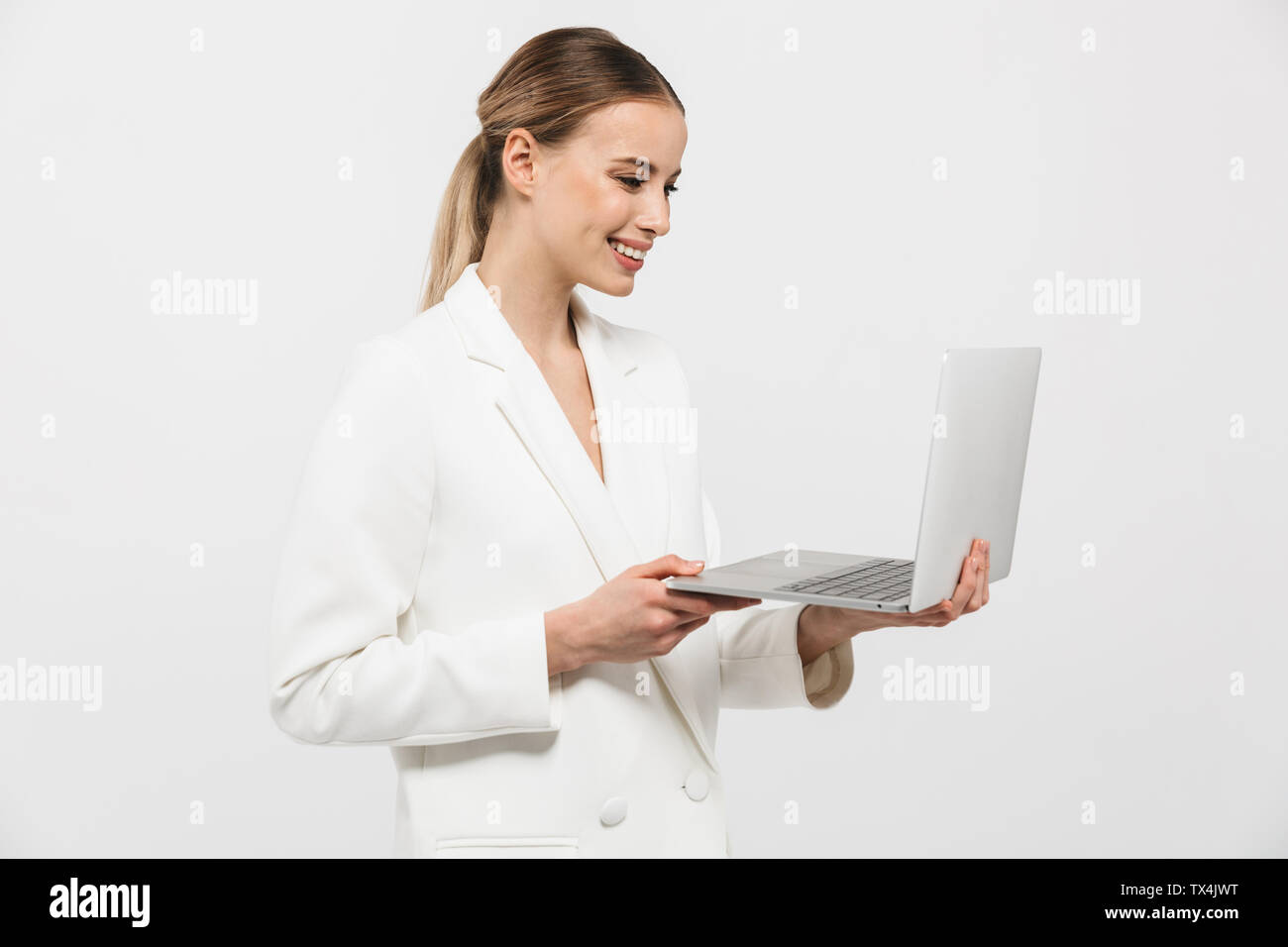 Image of a beautiful happy amazing woman posing isolated over white ...