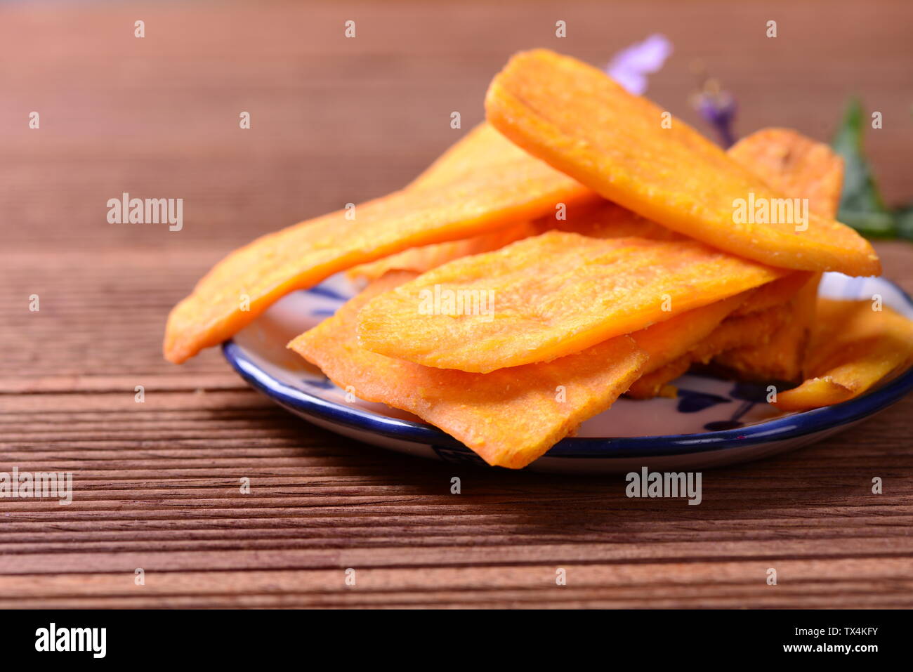 Sweet potato chips, sweet potato snacks Stock Photo - Alamy
