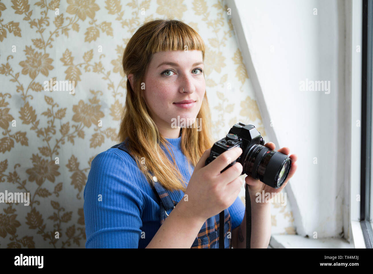 Female student using camera Stock Photo - Alamy