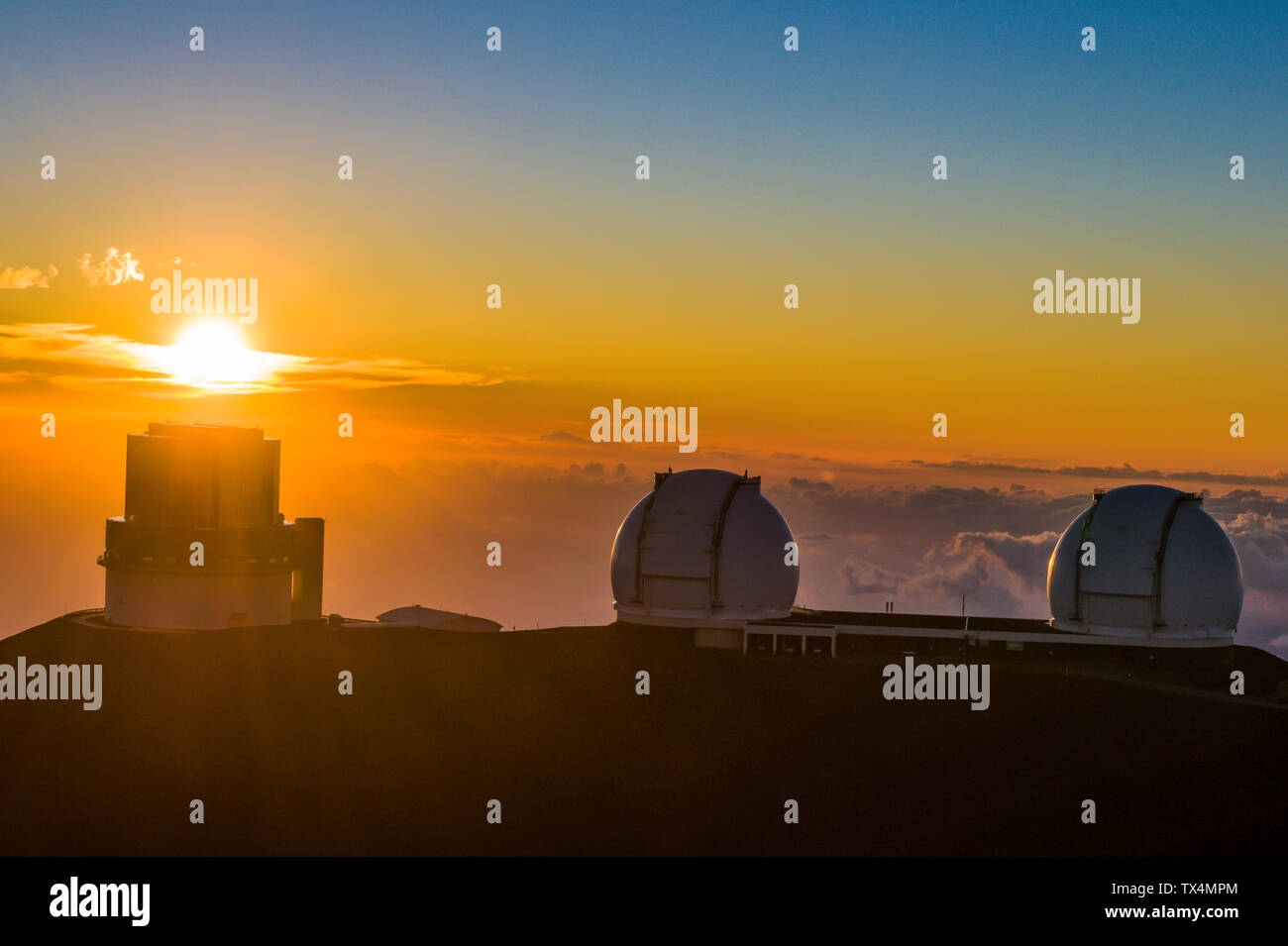 USA, Hawaii, Big Island, observatories on Mauna Kea volcano at sunset ...