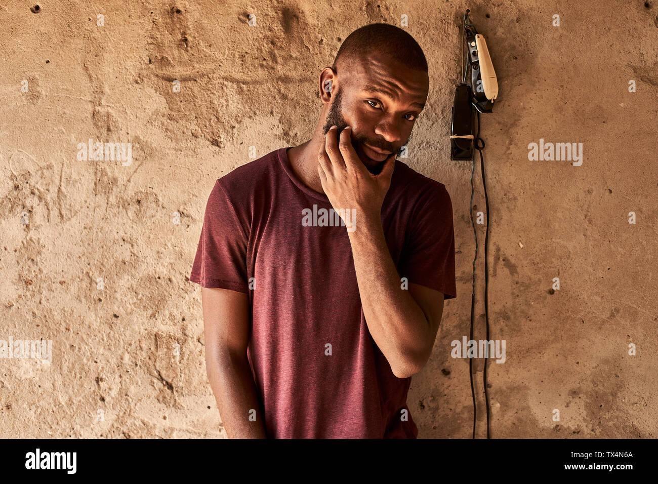 Mozambique, Maputo, portrait of bearded young man Stock Photo - Alamy