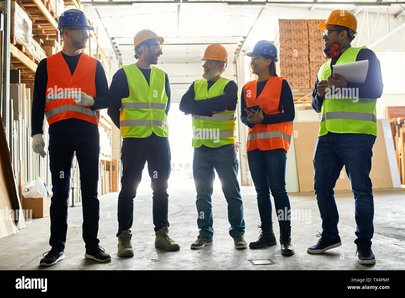 Group indian people standing talking hi-res stock photography and ...