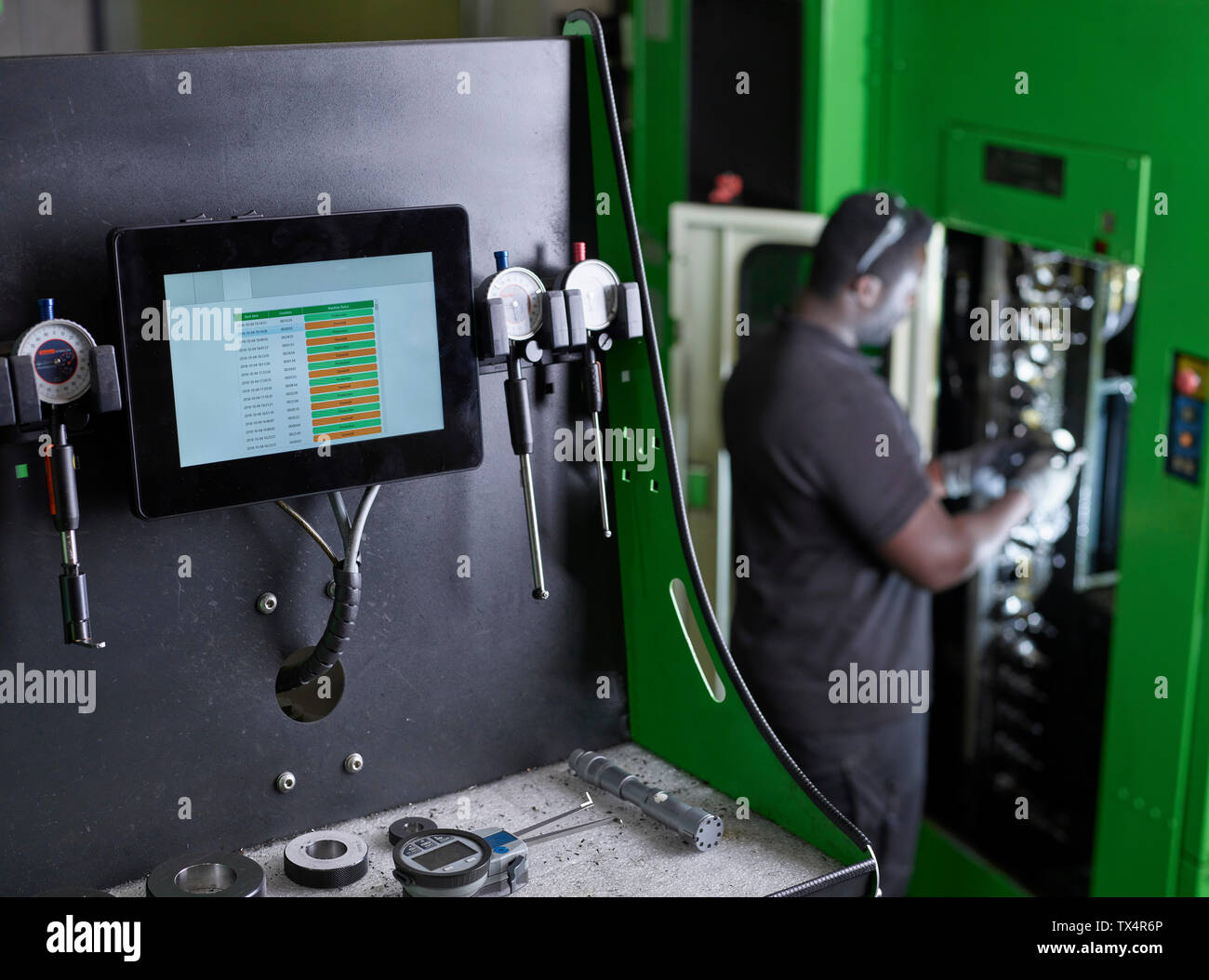 Man a machine hi-res stock photography and images - Alamy