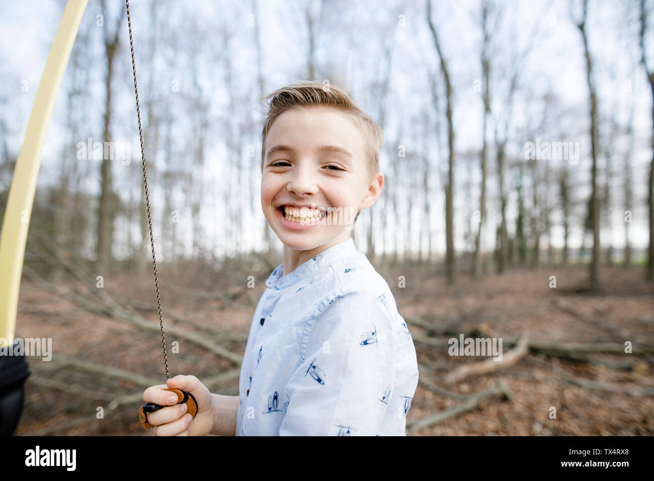 Boy with bow hi-res stock photography and images - Alamy