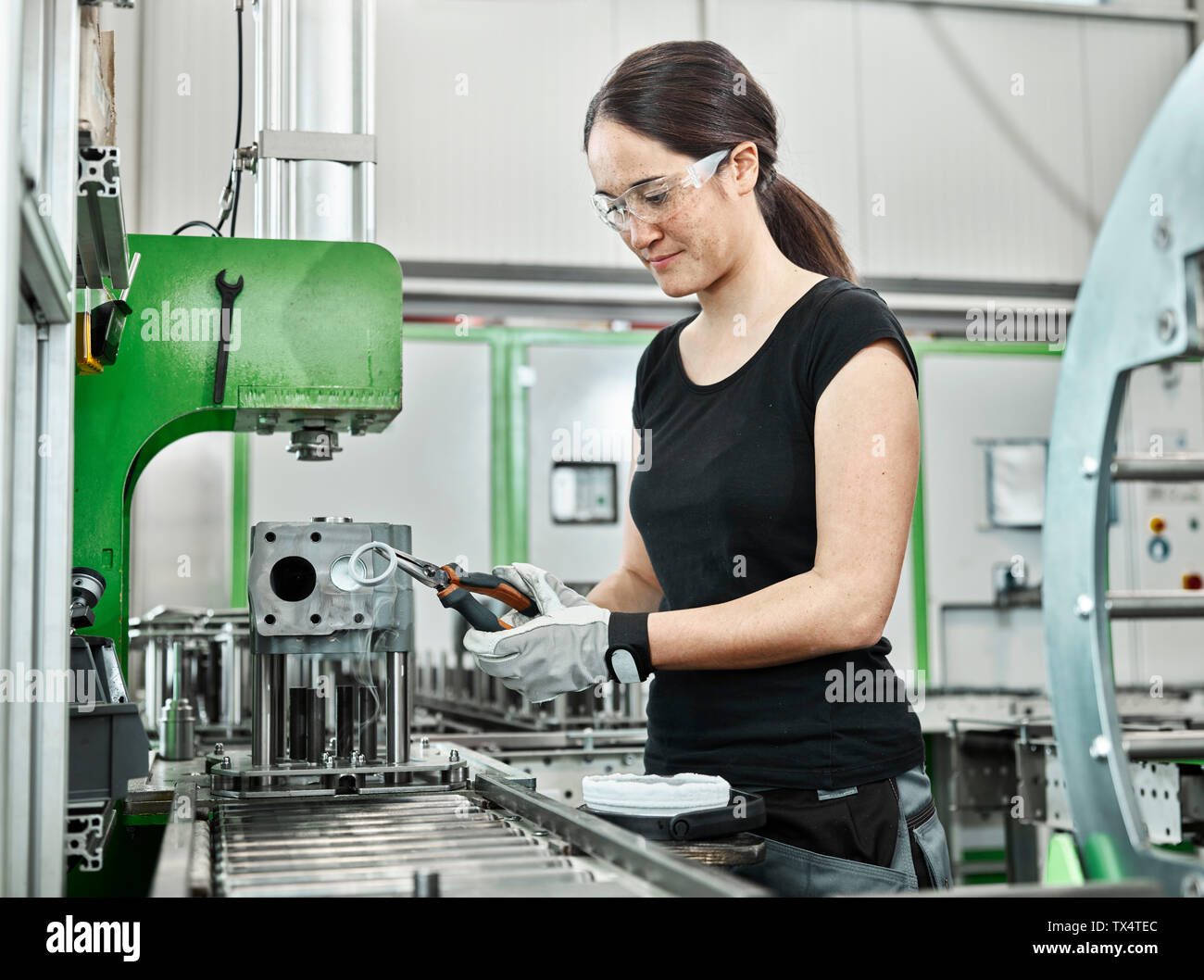 Young machine hi-res stock photography and images - Alamy