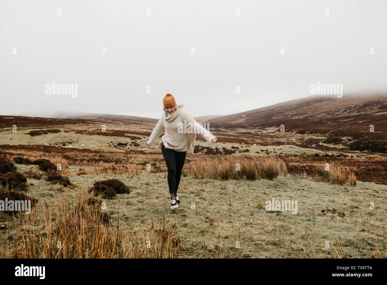 Woman enjoying the weather in scotland hi-res stock photography and ...