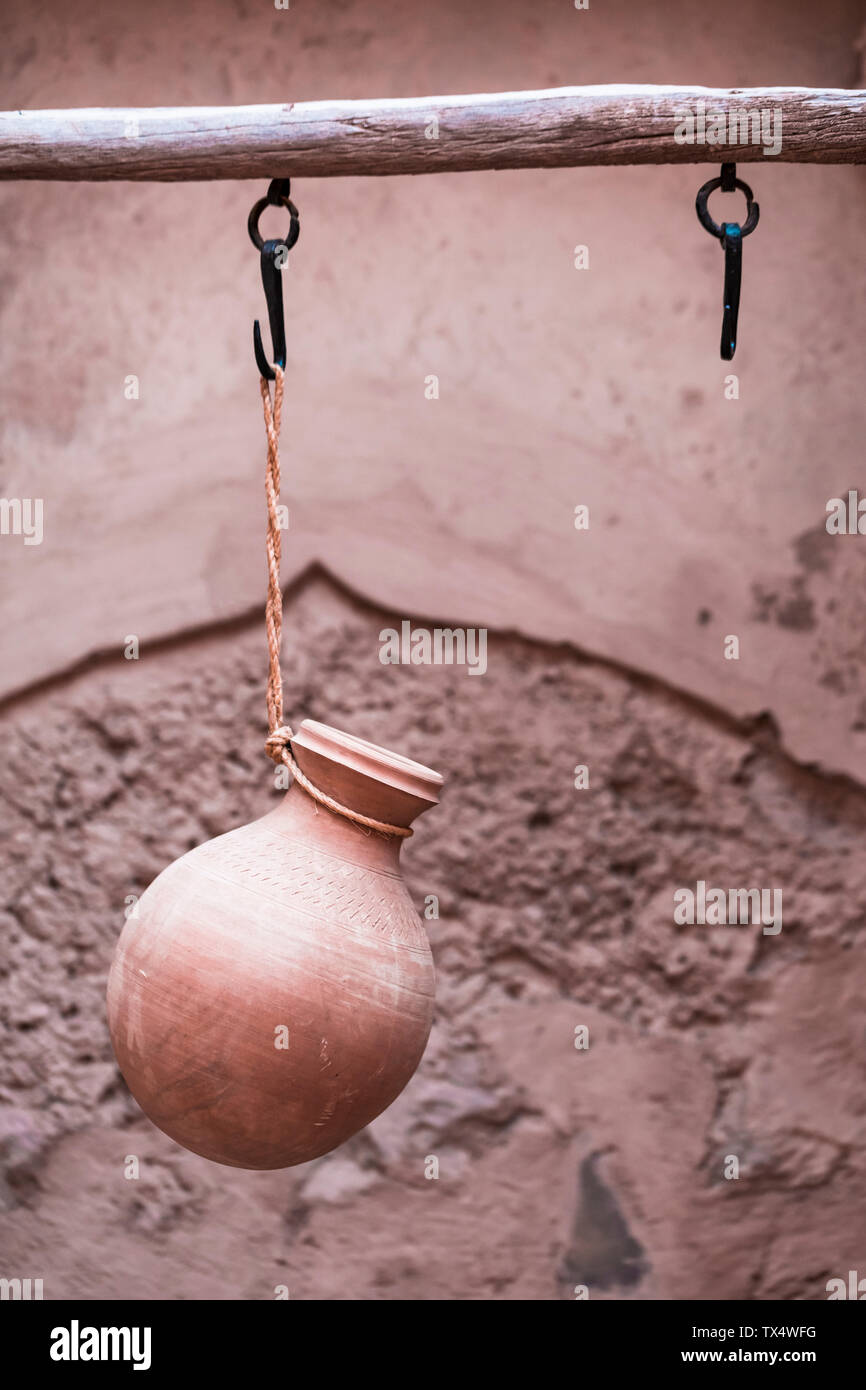 Clay jar hanging on a hook in nizwa fort hi-res stock photography and ...