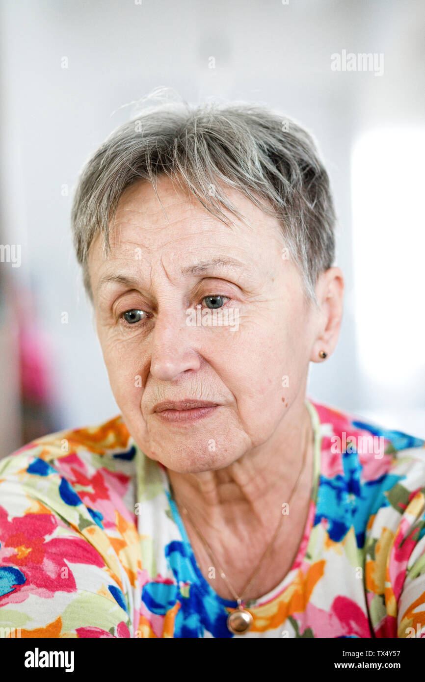 Portrait of a serious senior woman Stock Photo - Alamy
