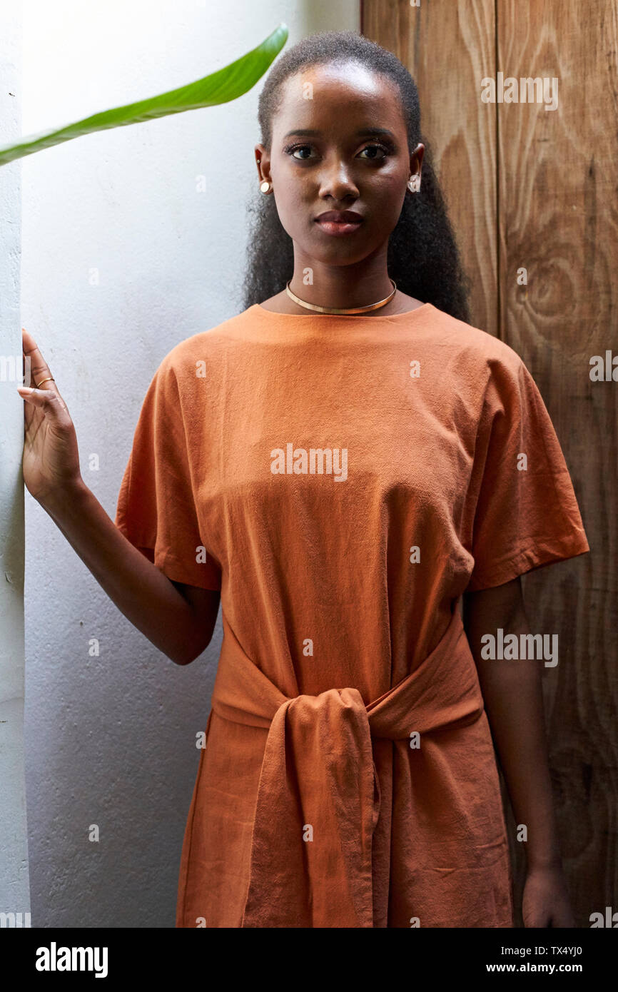 Wearing orange dress hi-res stock photography and images - Alamy