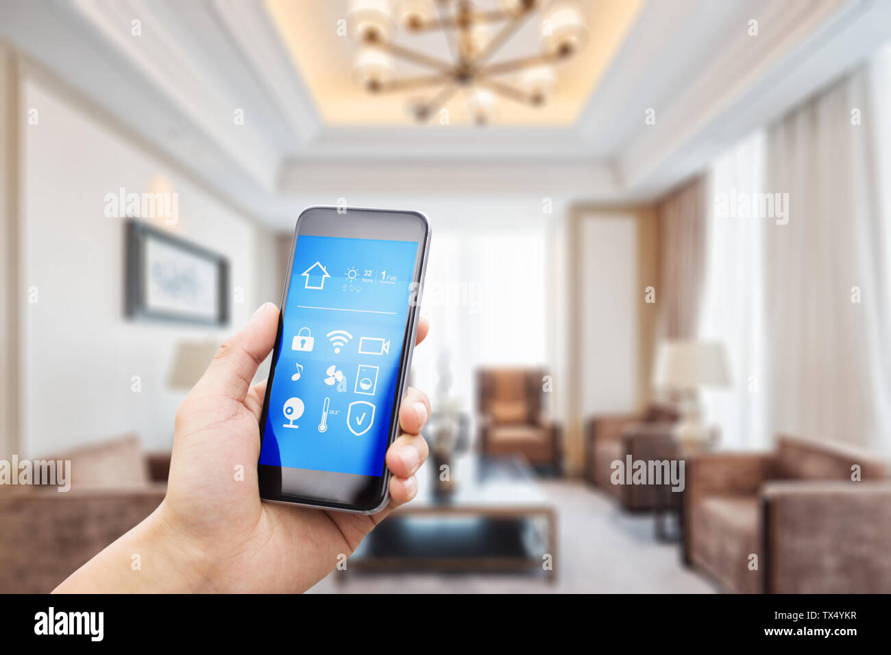 mobile phone with living room in smart home Stock Photo - Alamy