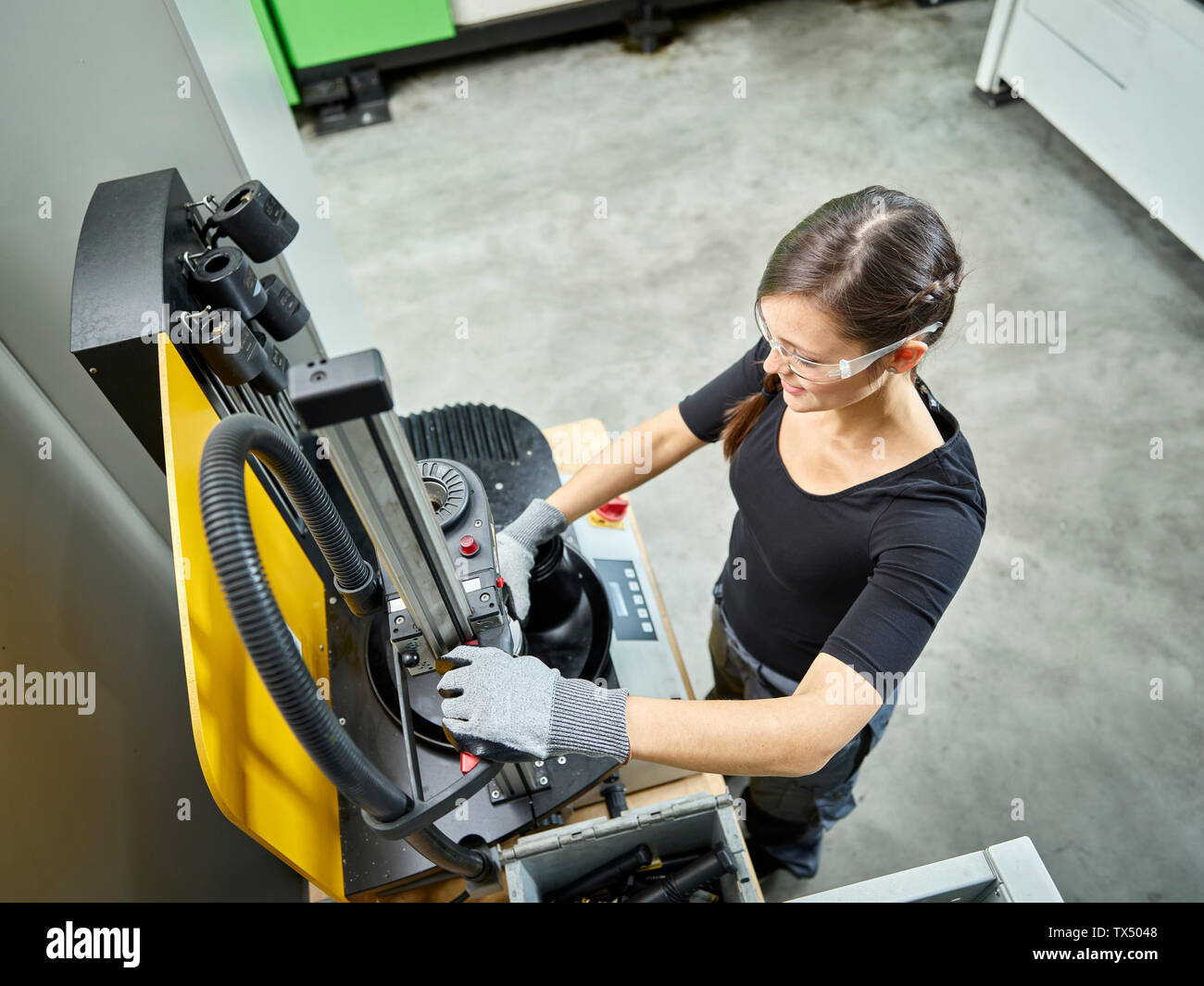 Woman working on industrial hi-res stock photography and images - Alamy