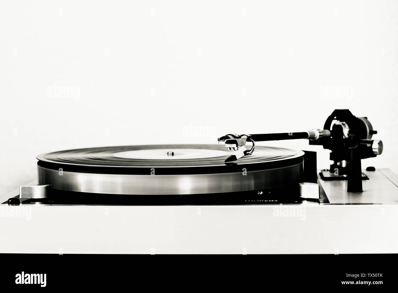 Vinyl record on record player Stock Photo - Alamy