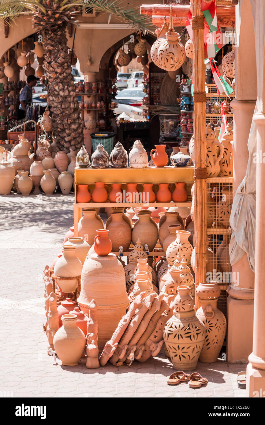 Traditional pottery in market stall, Nizwa, Oman Stock Photo - Alamy