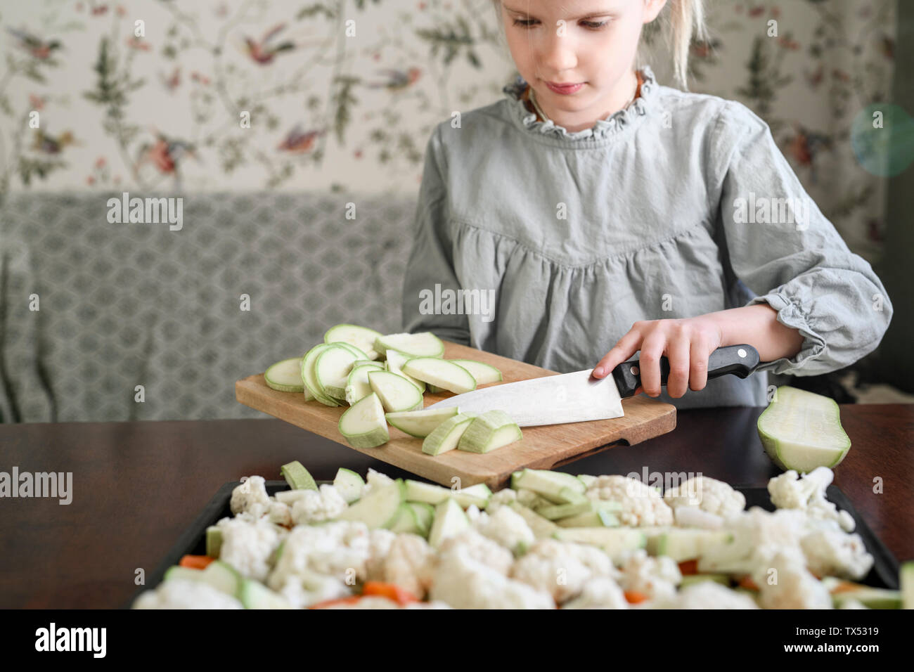 Girl pushing table hi-res stock photography and images - Alamy