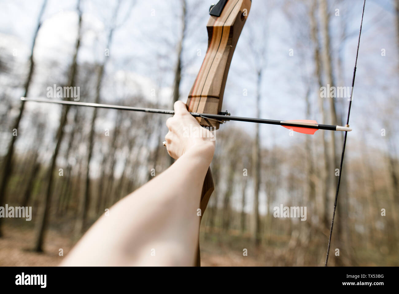 Hand holding arrow hi-res stock photography and images - Alamy