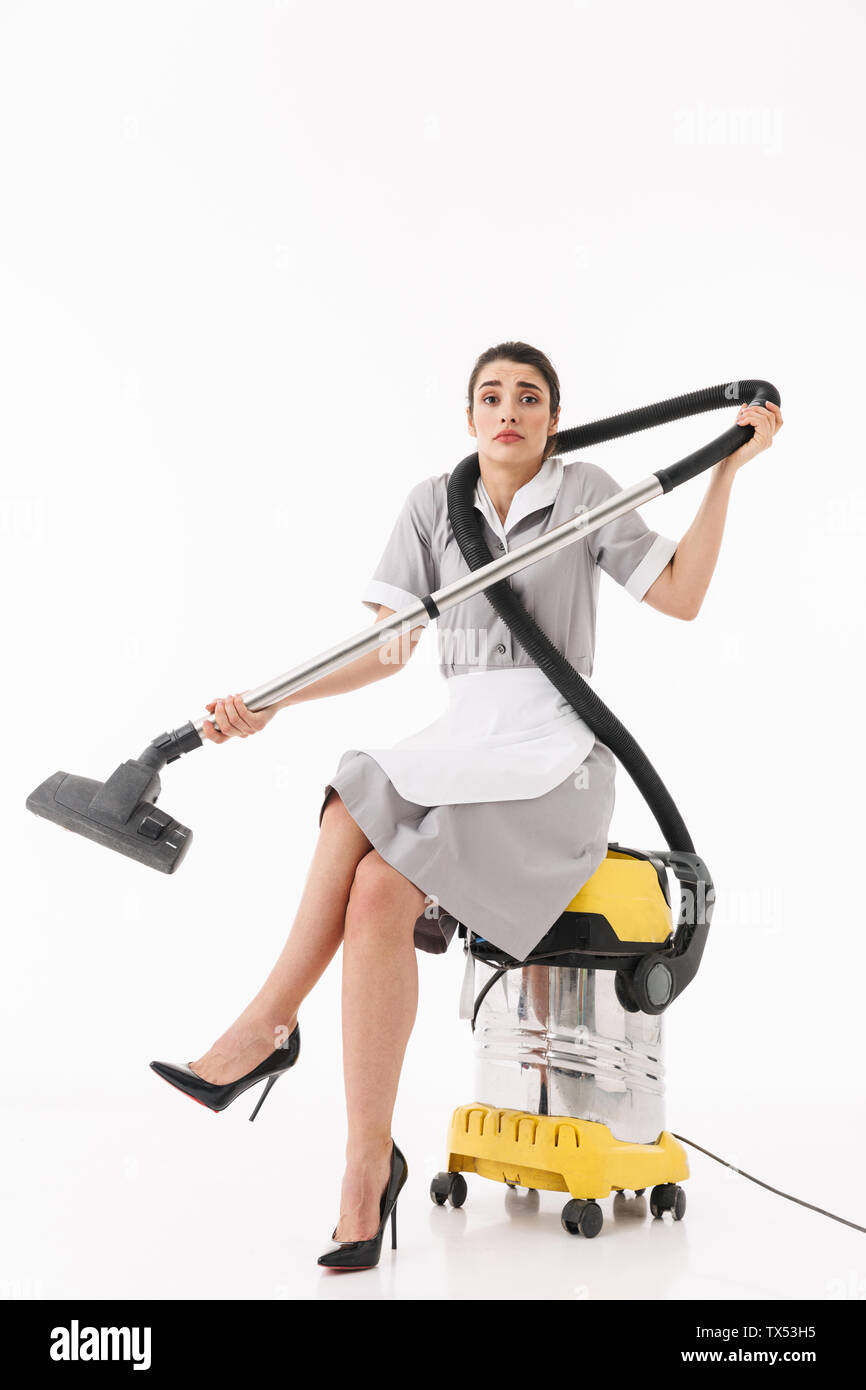 Woman in maid uniform sitting hi-res stock photography and images - Alamy