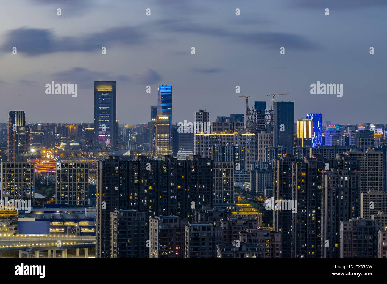 High rise building night scenery and bustling ningbo twin towers hi-res stock photography and ...