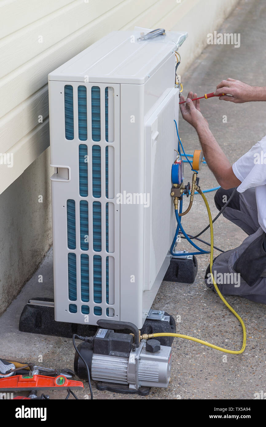 Installing heat pump hi-res stock photography and images - Alamy
