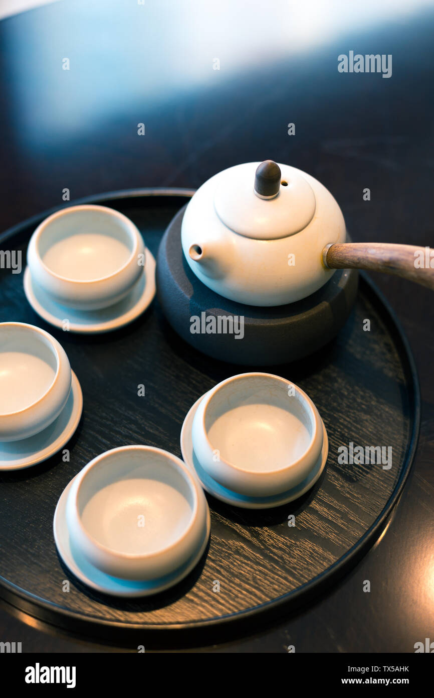 Chinese tea set on plate Stock Photo - Alamy