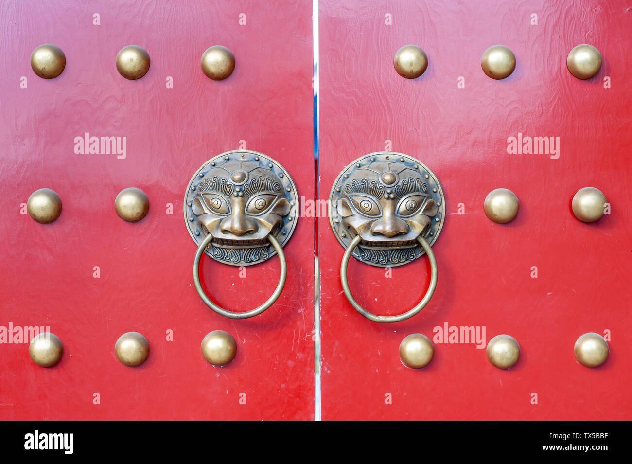 Traditional red wooden door Stock Photo - Alamy