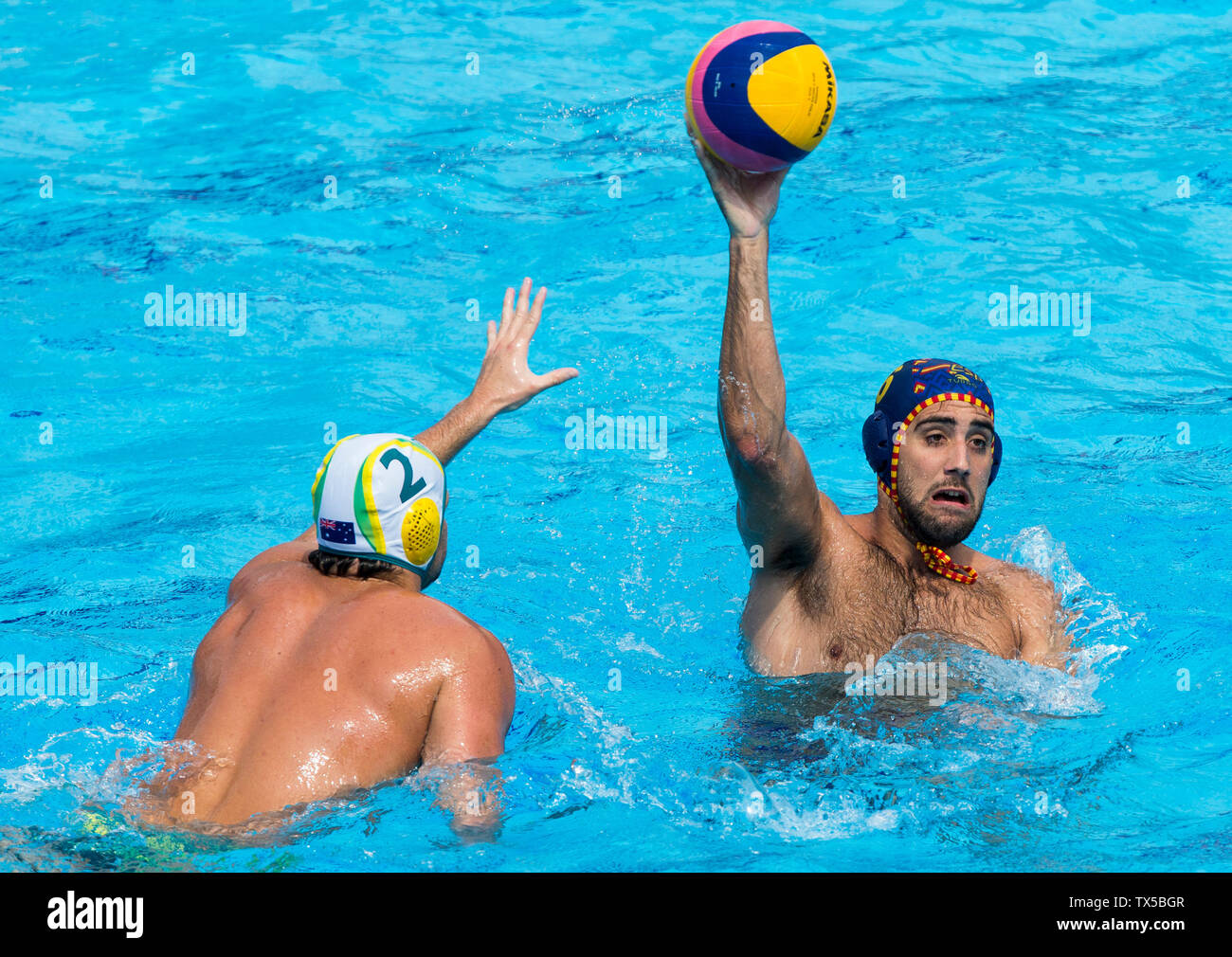 Marc Larumbe Gonfaus of Spain vies with Richard Campbell of Australia ...