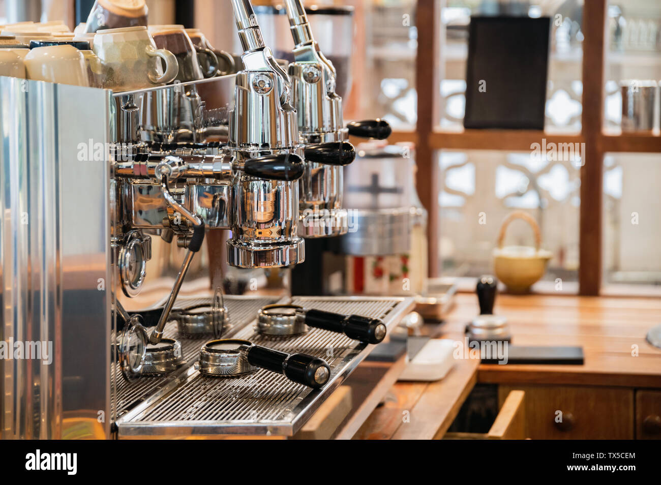 Aluminium large coffee maker two grinders in wooden bar in cafe Stock ...
