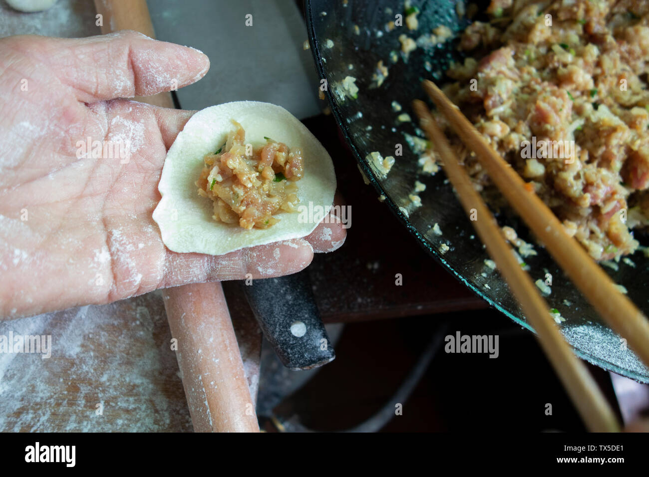The Making Process of Chinese Traditional Gourmet Dumplings Stock Photo ...