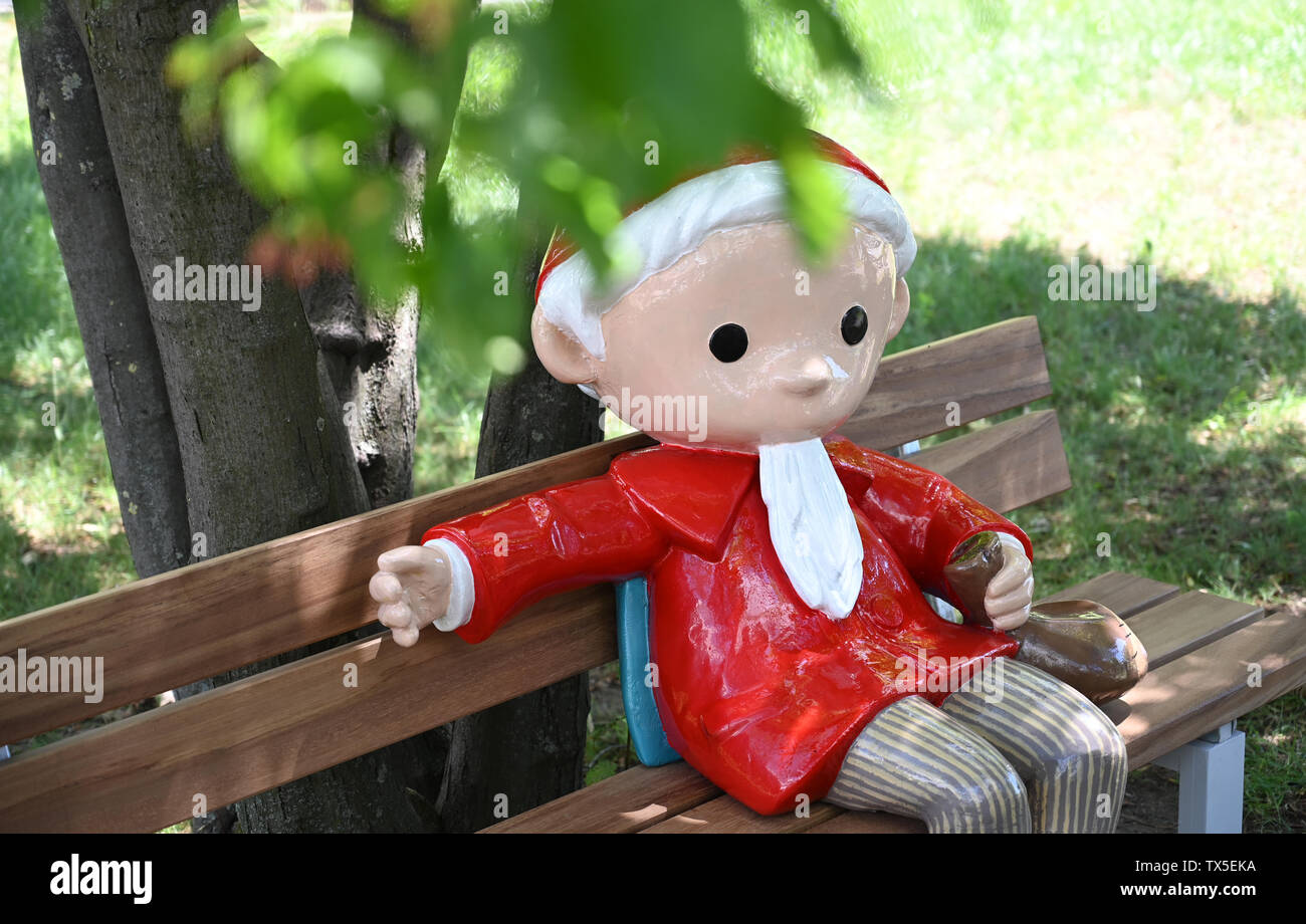 Berlin, Germany. 24th June, 2019. A new Sandman figure is sitting on a ...