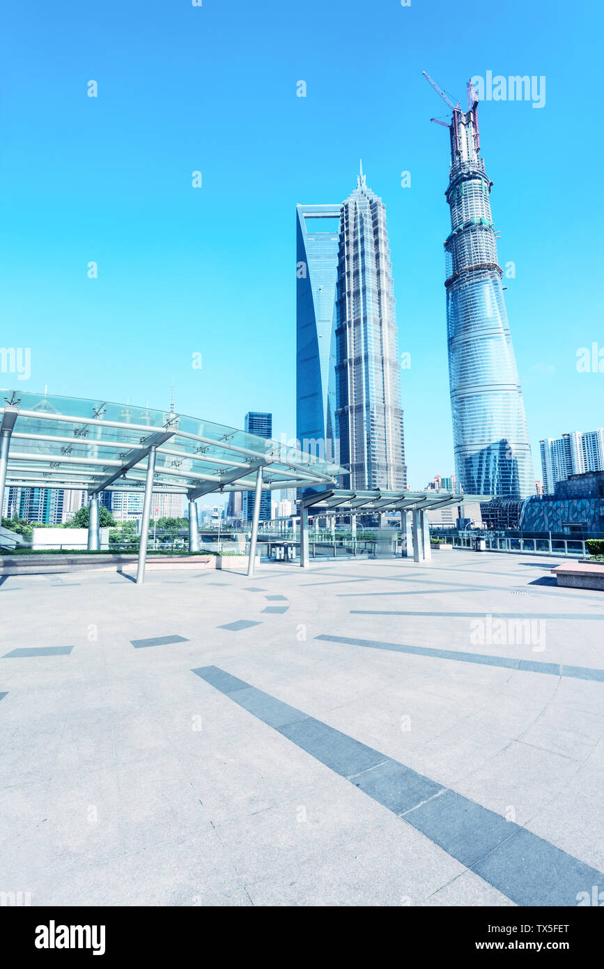 modern office buildings in shanghai from empty footpath Stock Photo - Alamy