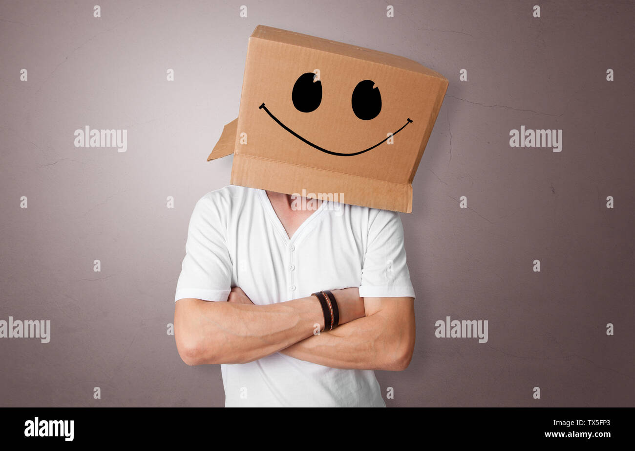 Man with cardboard box head Stock Photo - Alamy
