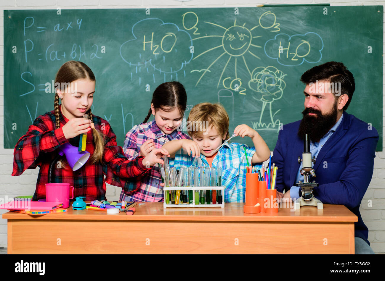 school kids scientist studying science. back to school. happy children ...