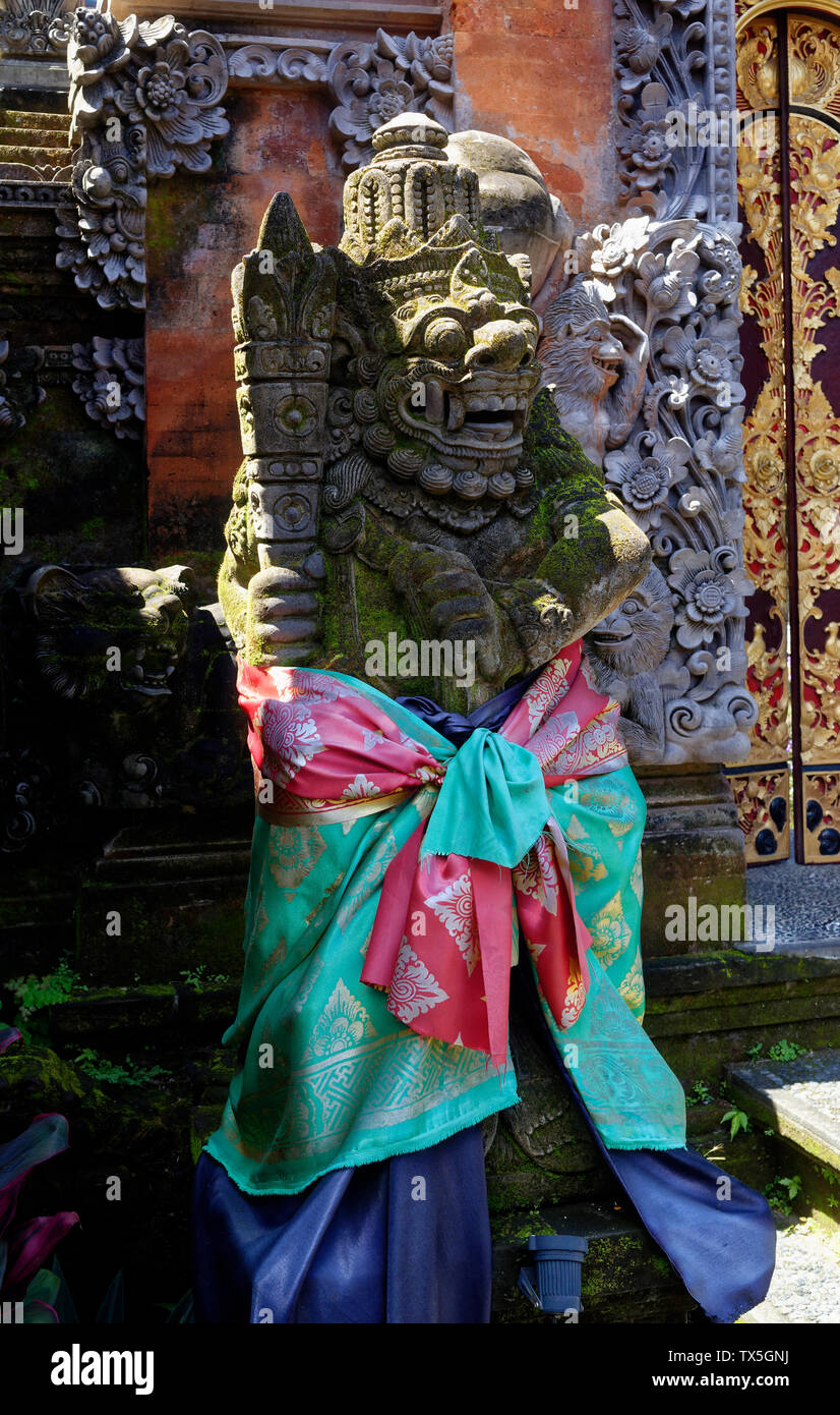 Balinese Bedogal, with saraong, the demonic statues that act as ...