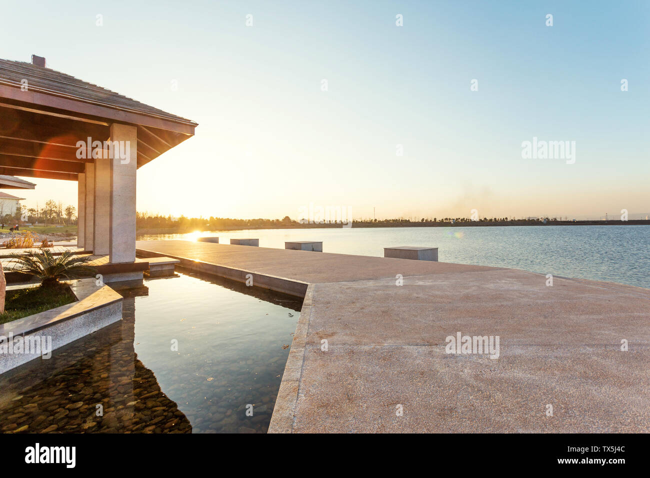 Sunset skyline near resort lakeside Stock Photo - Alamy