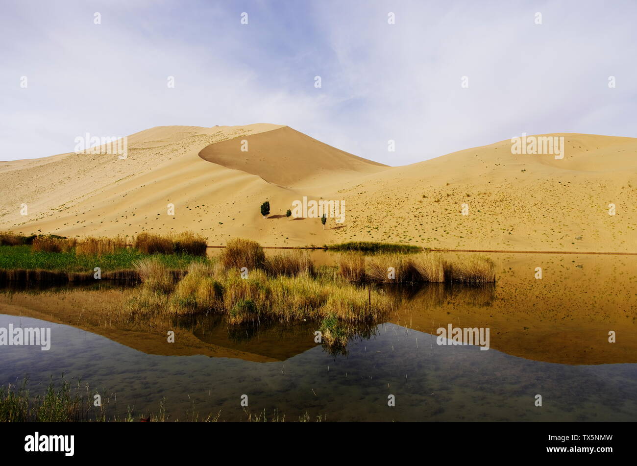 Crescent Spring in Mingsha Mountain, Dunhuang, Gansu Province Stock ...