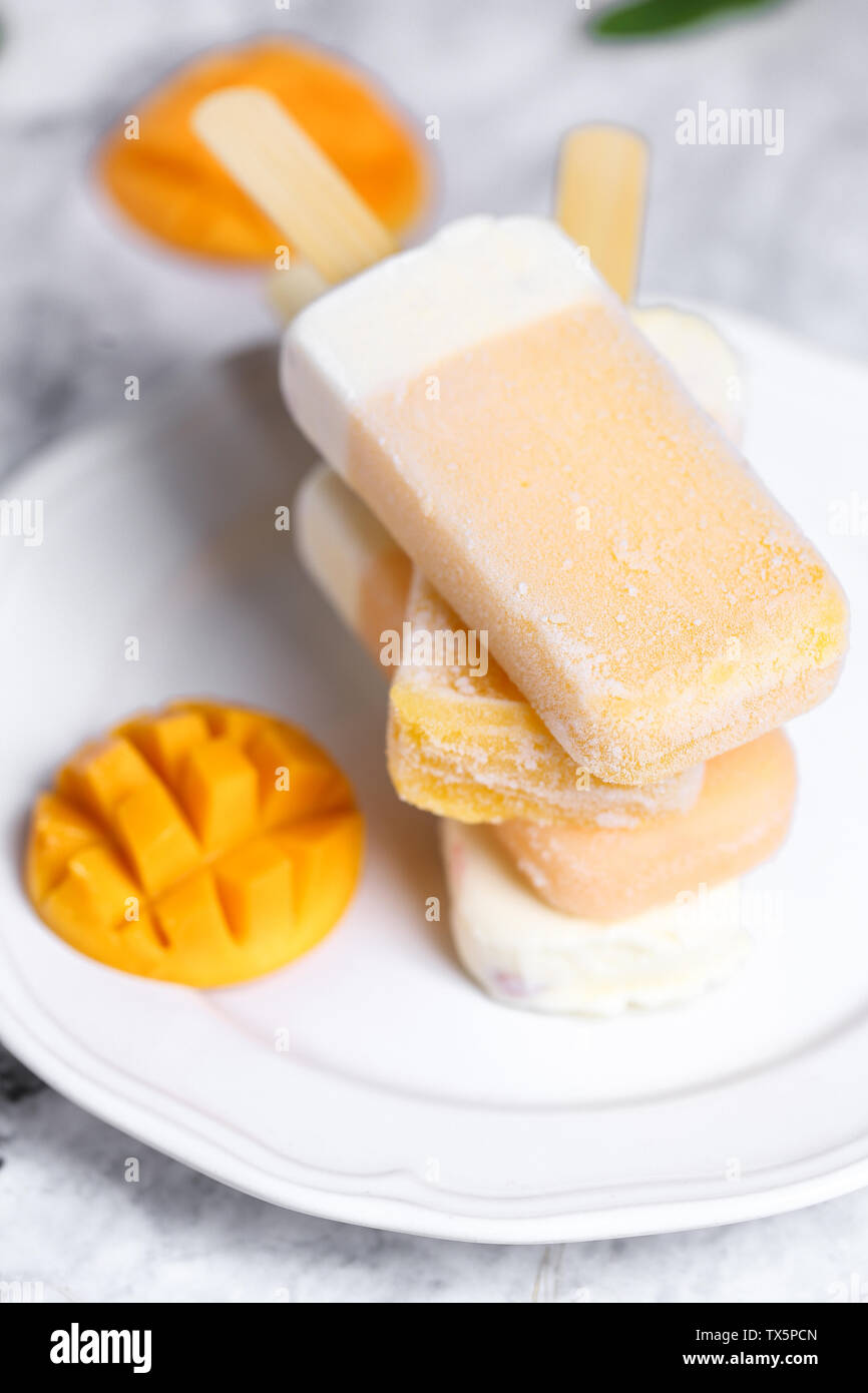 Mango milk pops Stock Photo - Alamy