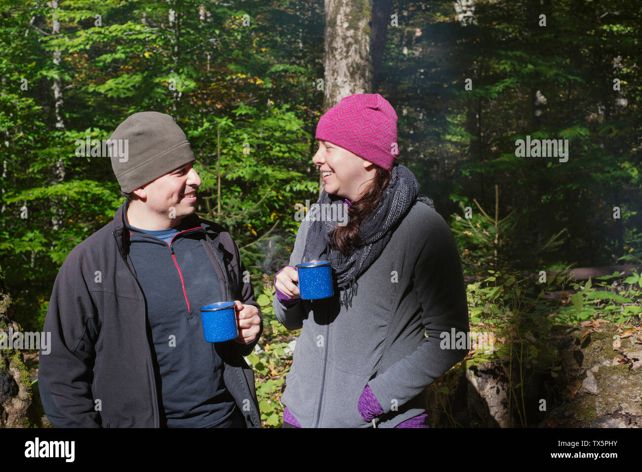 Happy people laughing coffee outside hi-res stock photography and ...