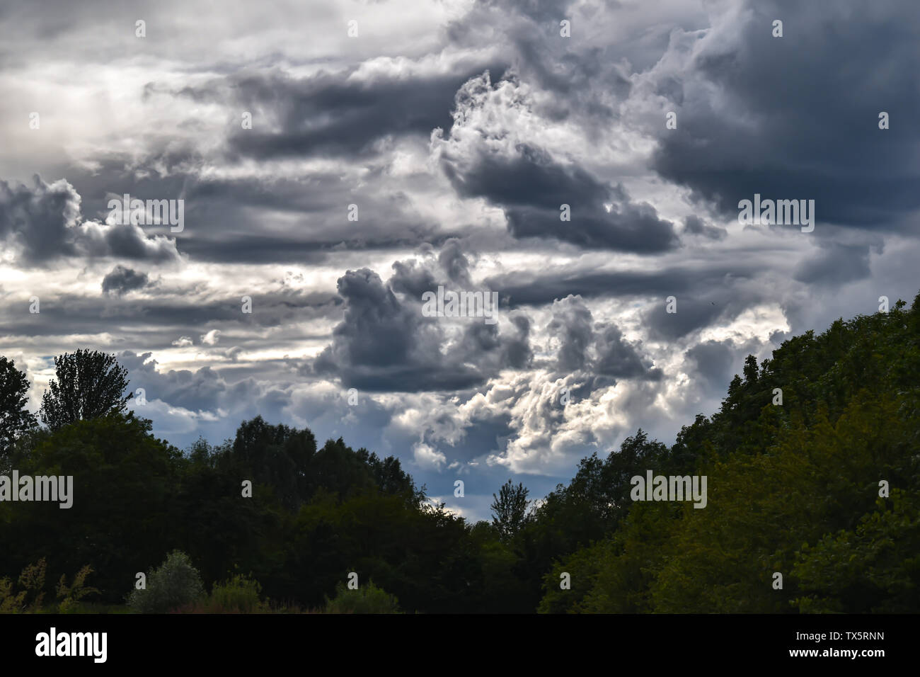 Storm clouds roll in over the British countryside Stock Photo - Alamy