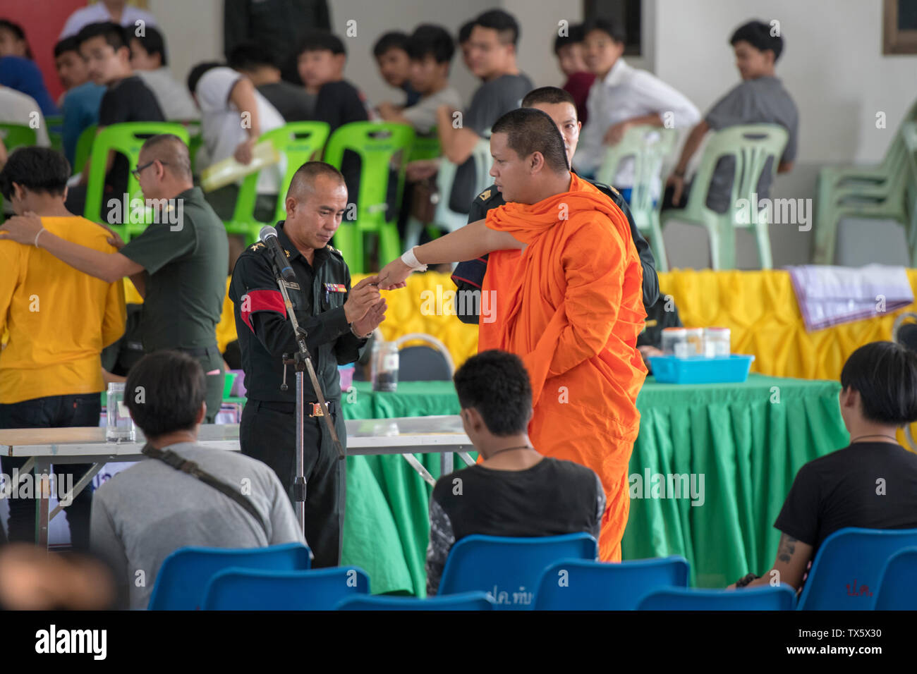 Monk during Army conscription process in Thailand Stock Photo - Alamy