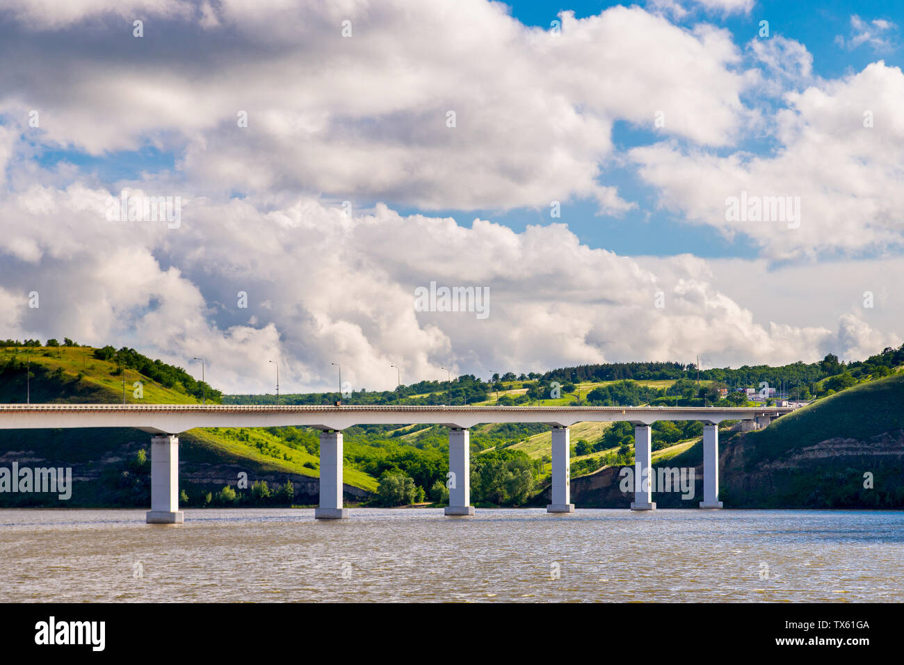 View of hills and steppe and a modern bridge over upper river Don in ...