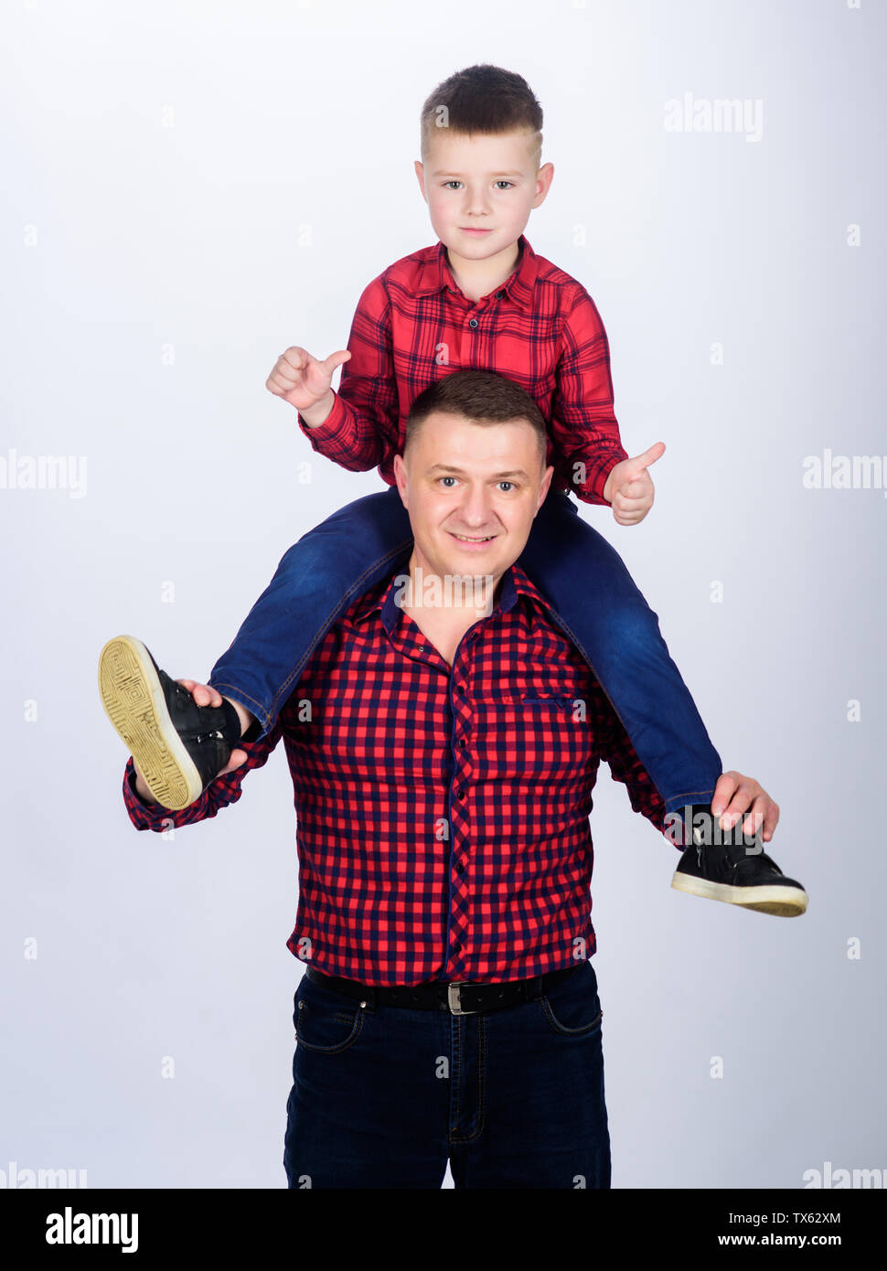 Father example of noble human. Father little son red shirts family look ...