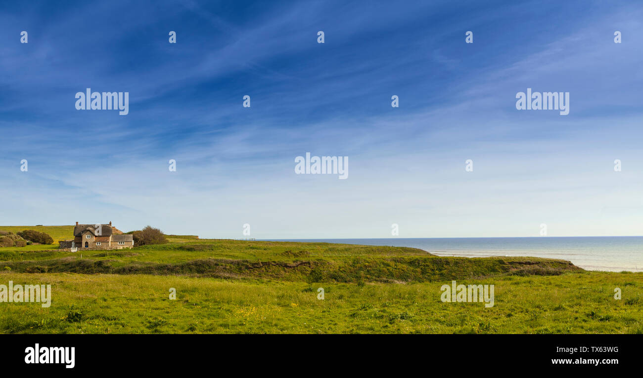 An old cottage in the landscape at Brook Beach ,Isle Of Wight Stock ...