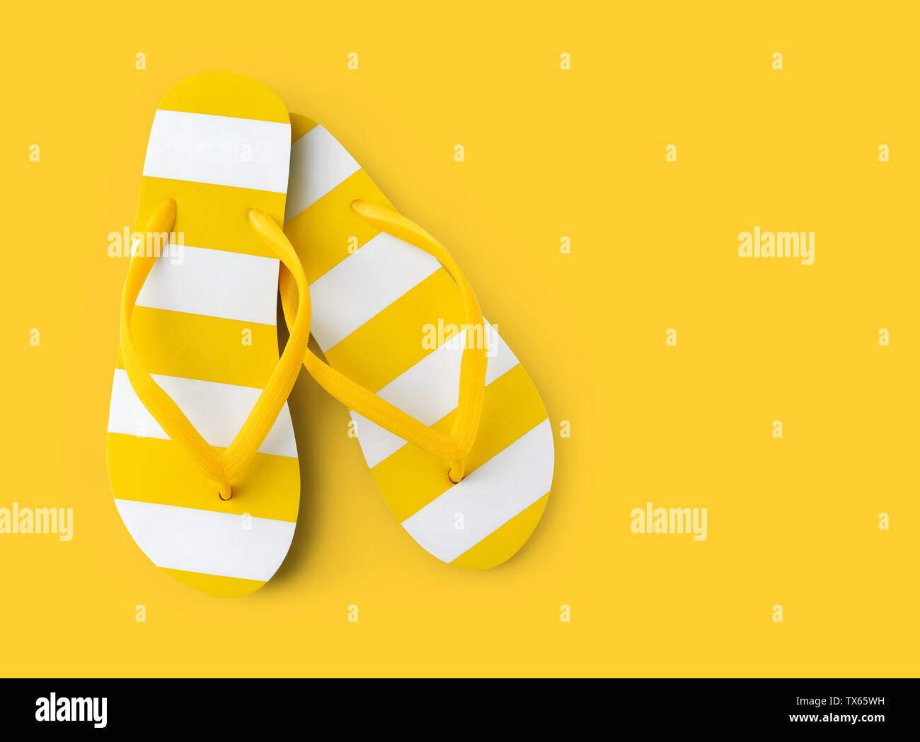 Yellow flip flop hi-res stock photography and images - Alamy