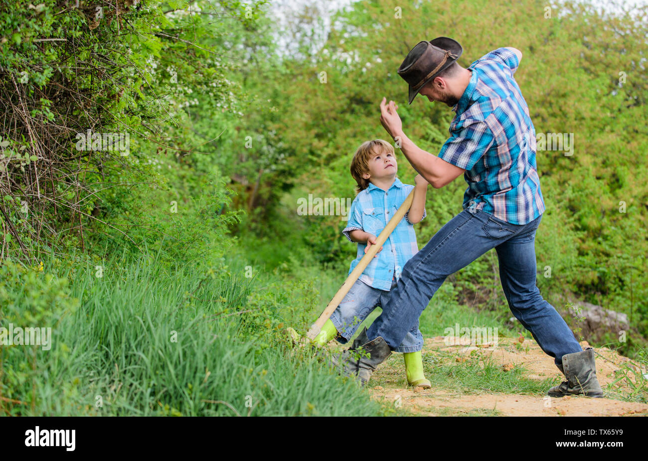 Adventure hunting for treasures. Little helper in garden. Cute child in ...